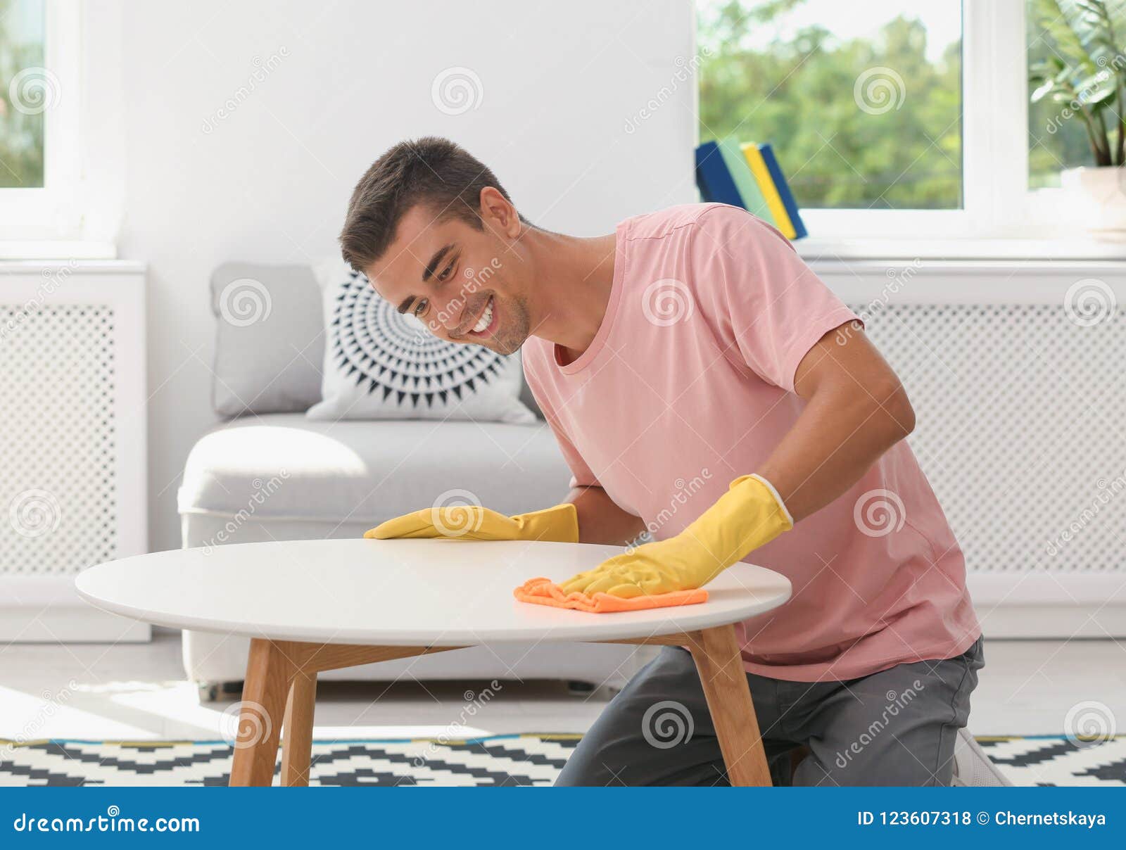 Man Cleaning Table with Rag Stock Photo - Image of dirt, clean: 123607318