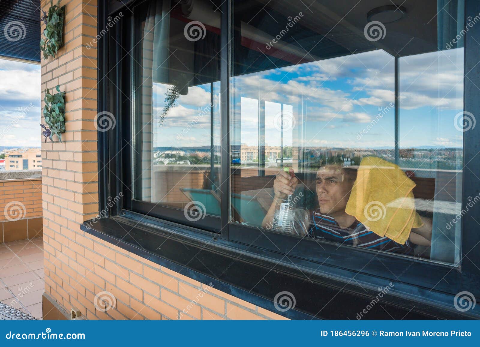 Man cleaning the windows stock photo. Image of husband - 186456296