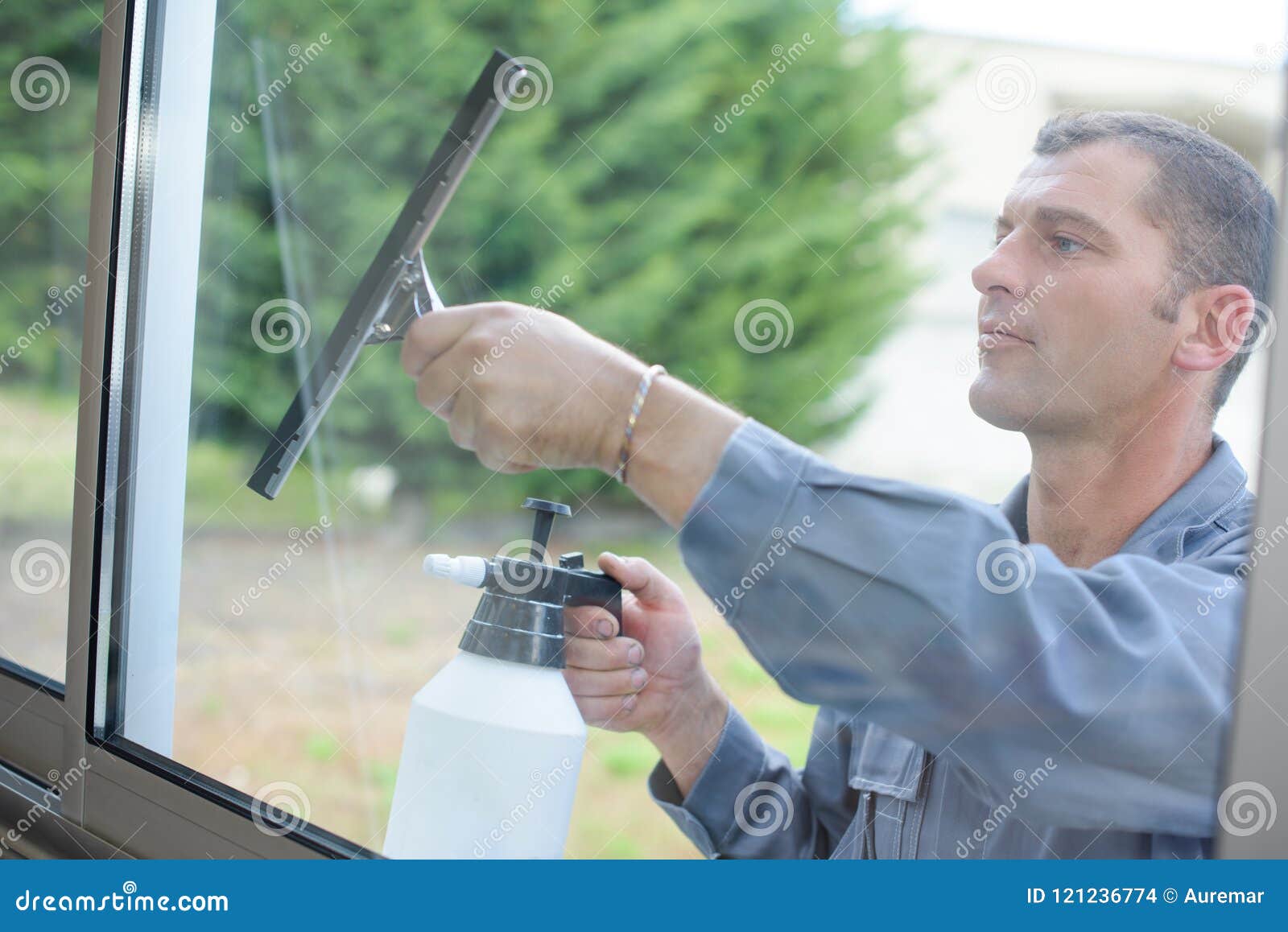 Man Cleaning Windows with Squeegee Stock Photo - Image of wash ...