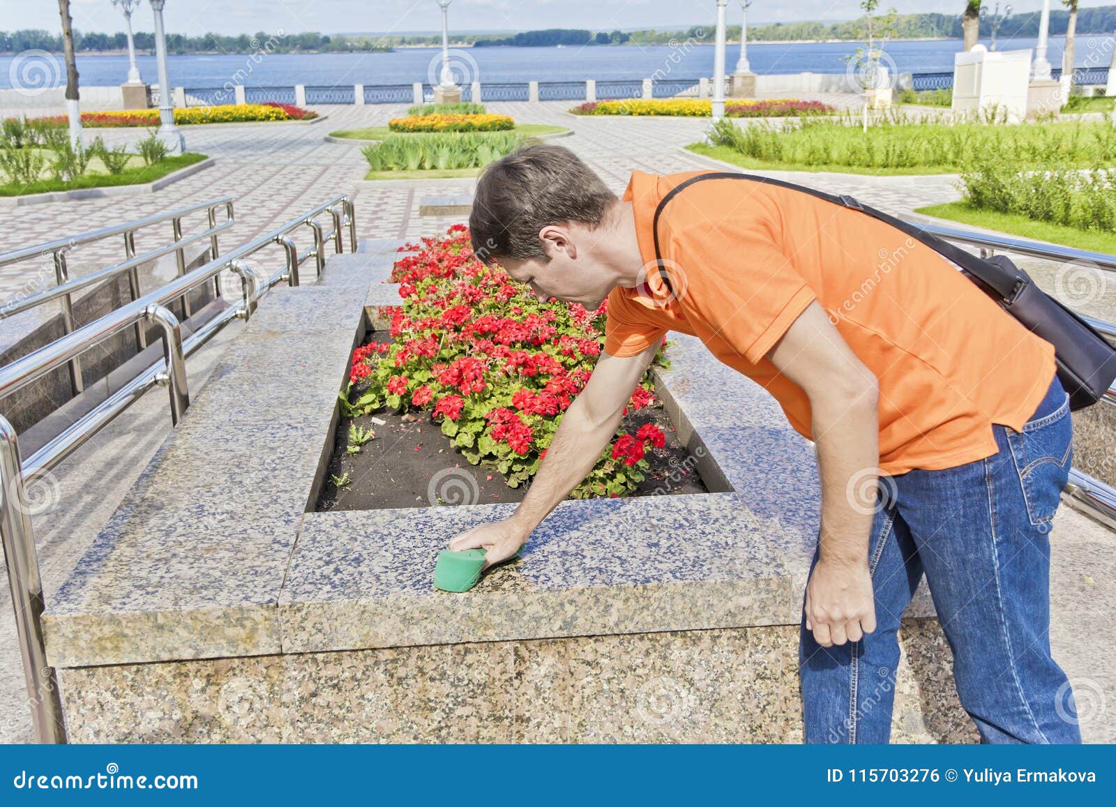 Man is Cleanning Embankment Bench Stock Photo - Image of casual, shaten ...