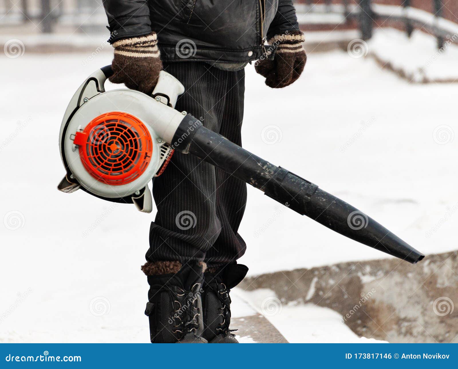 Man Cleans Street from Snow with Blower Stock Photo - Image of ...
