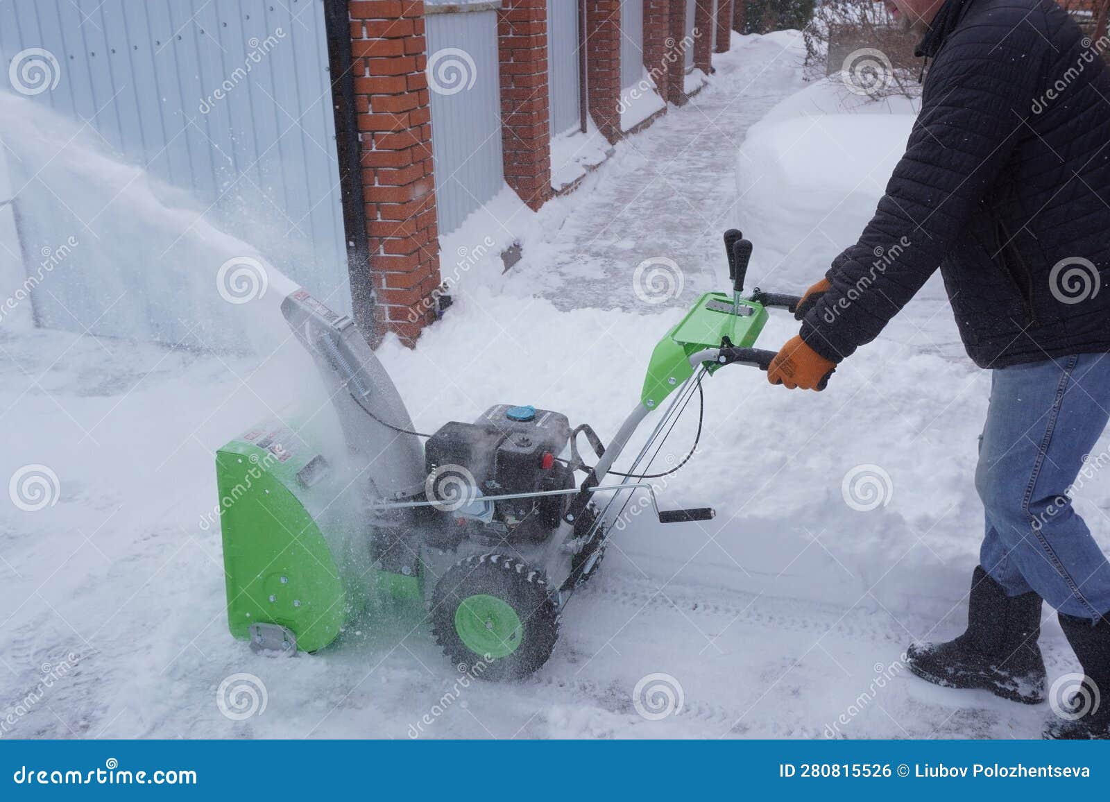 A Man Cleans Snow in the Winter in the Courtyard of the House, Man ...