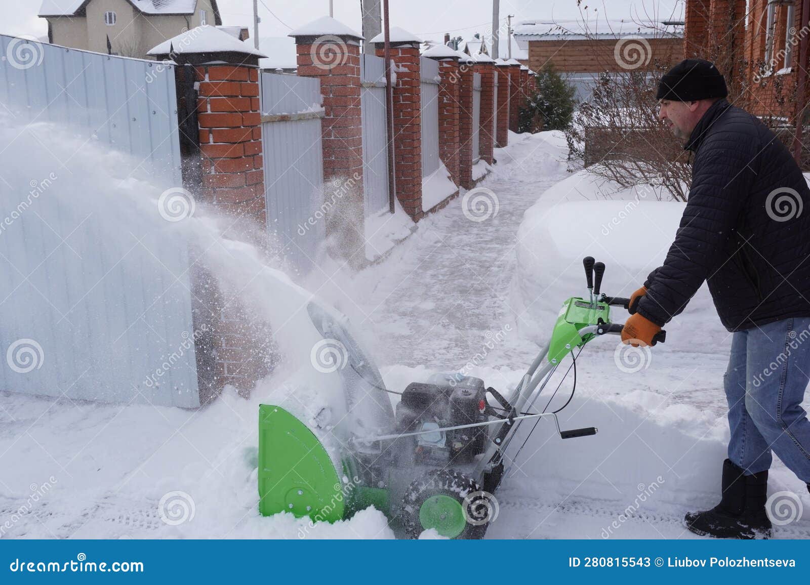 A Man Cleans Snow in the Winter in the Courtyard of the House, Man ...