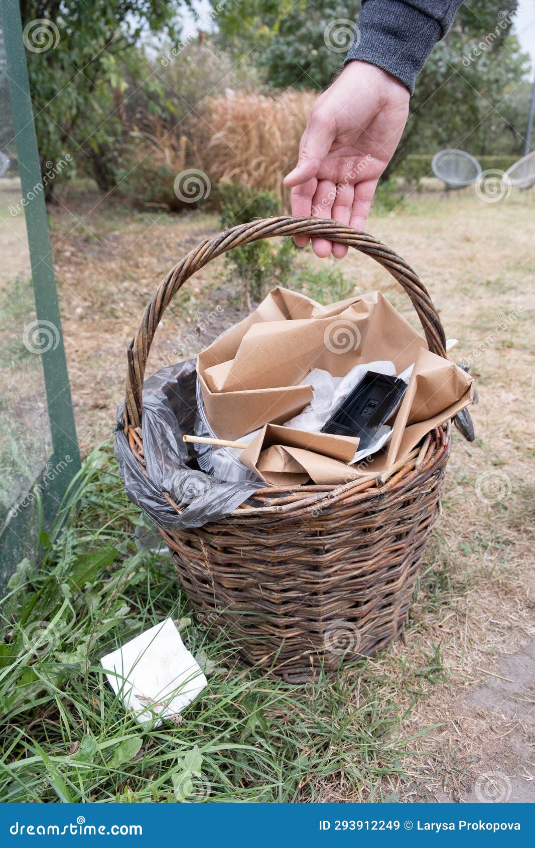 A man cleans a trash can stock image. Image of cleanliness - 293912249