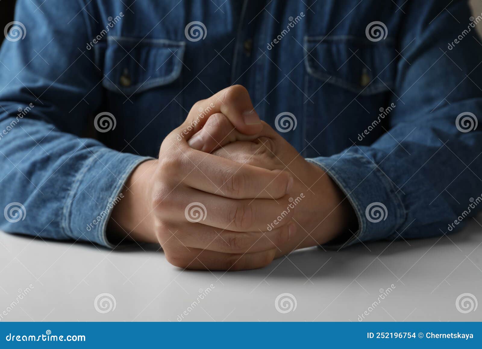 Man Clenching Hands at Table while Restraining Anger, Closeup Stock ...