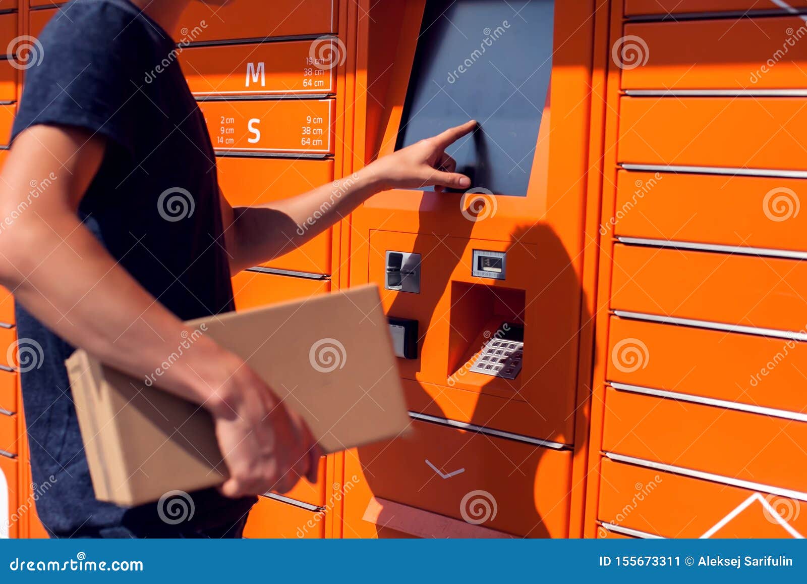 Man Client Using Automated Self Service Post Terminal Machine or Locker ...