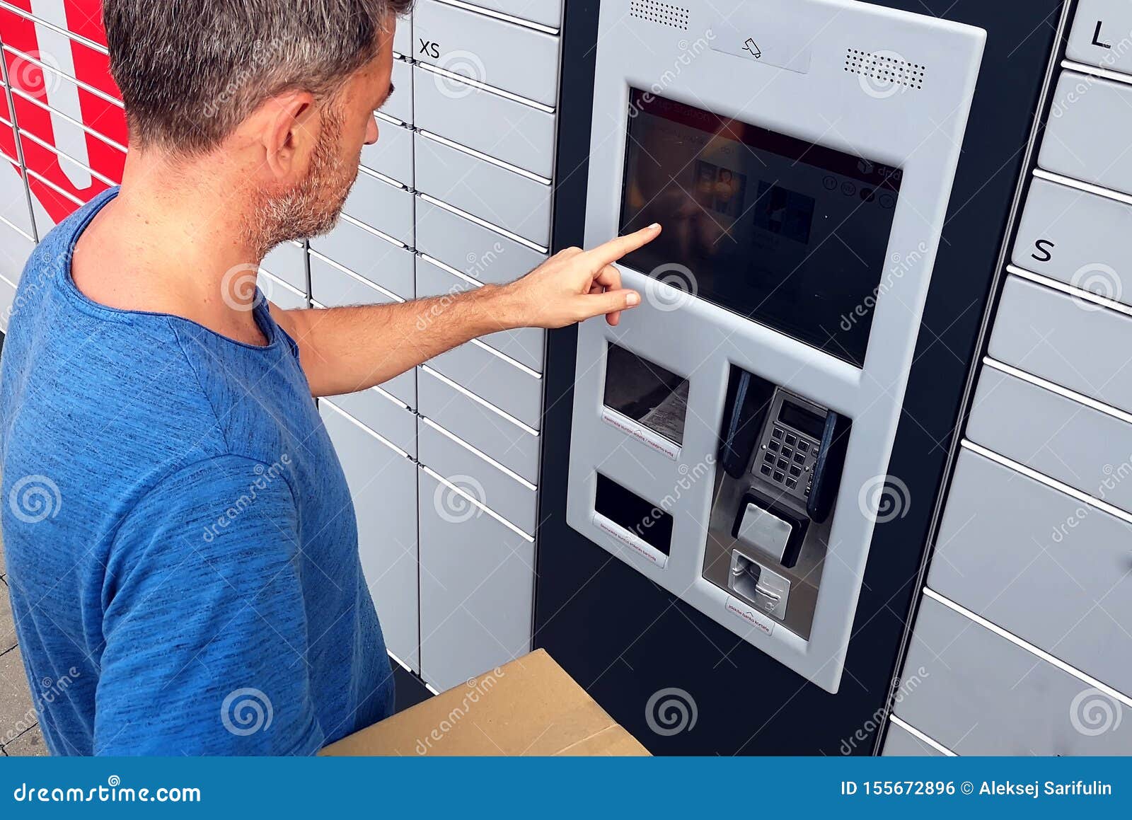 Client Using Automated Self Service Post Terminal Machine or Locker To ...