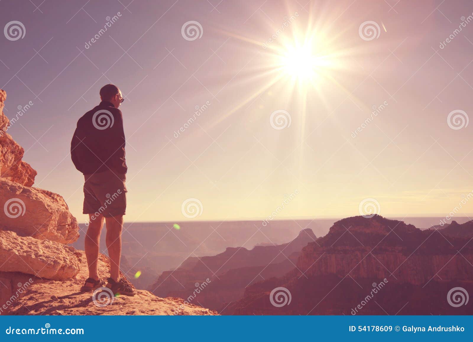 Man on the cliff stock image. Image of mountains, male - 54178609