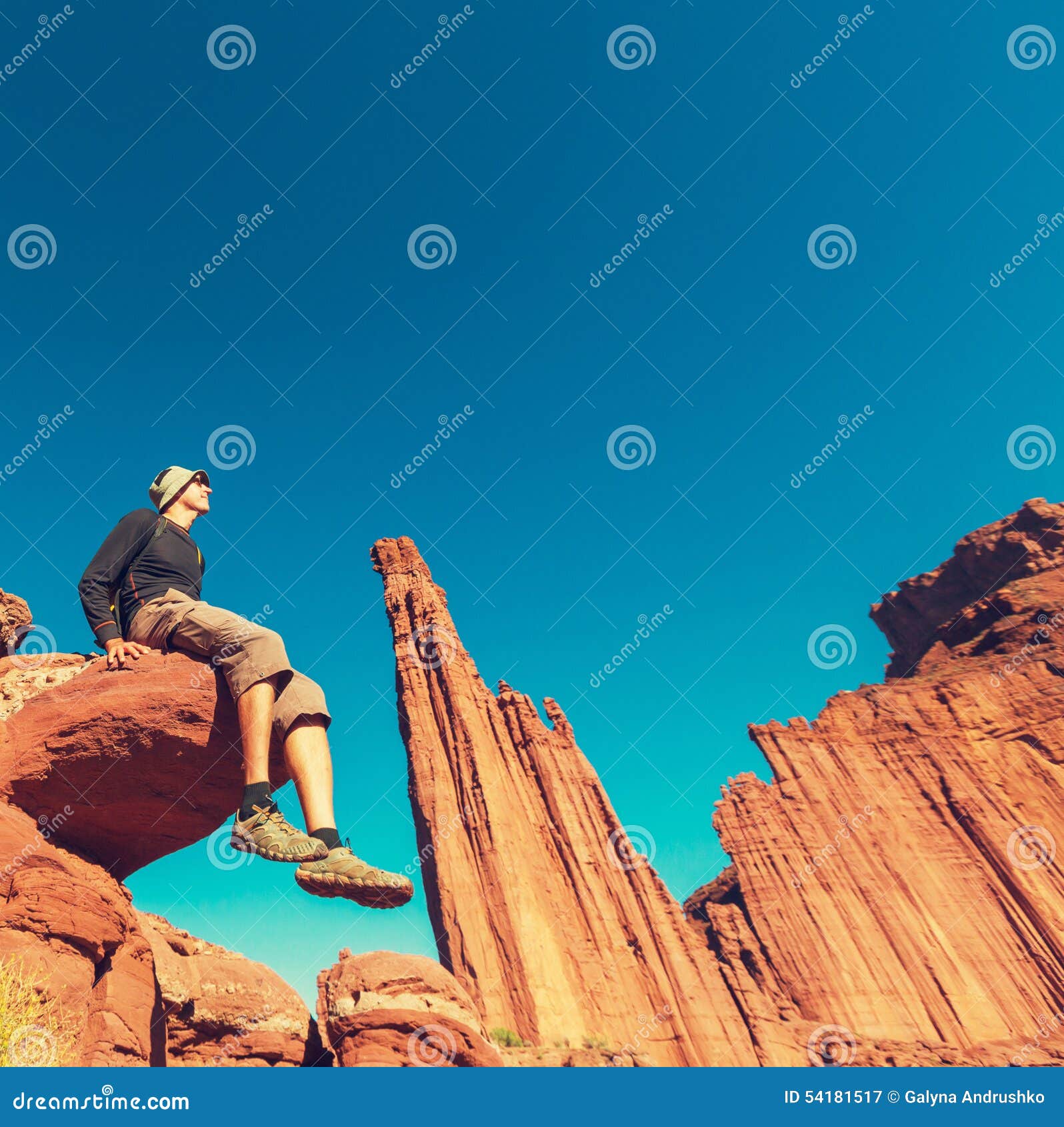 Man on the cliff stock image. Image of mountains, rock - 54181517