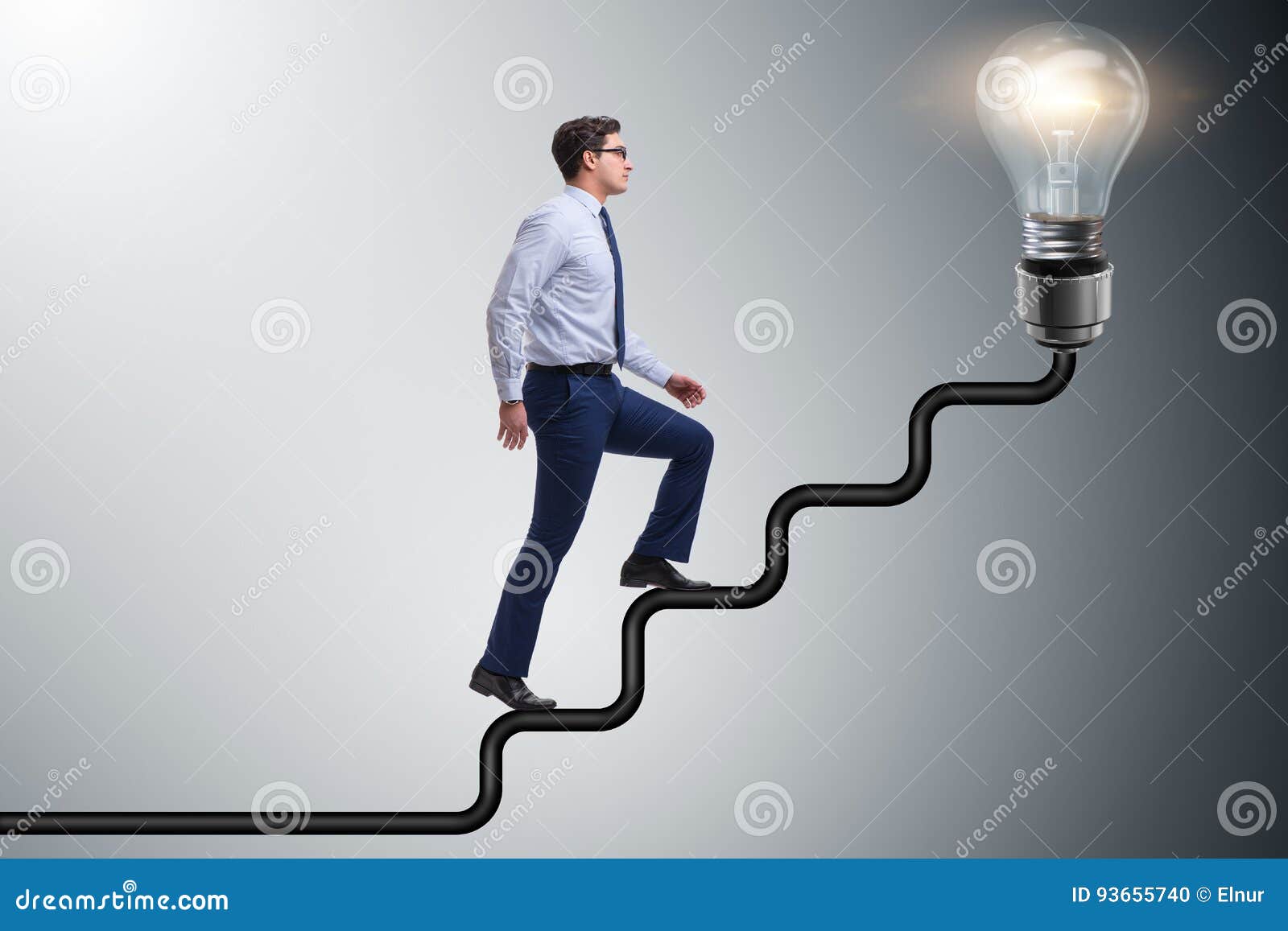 The Man Climbing Career Ladder Towards Bright Light Bulb Stock Photo ...