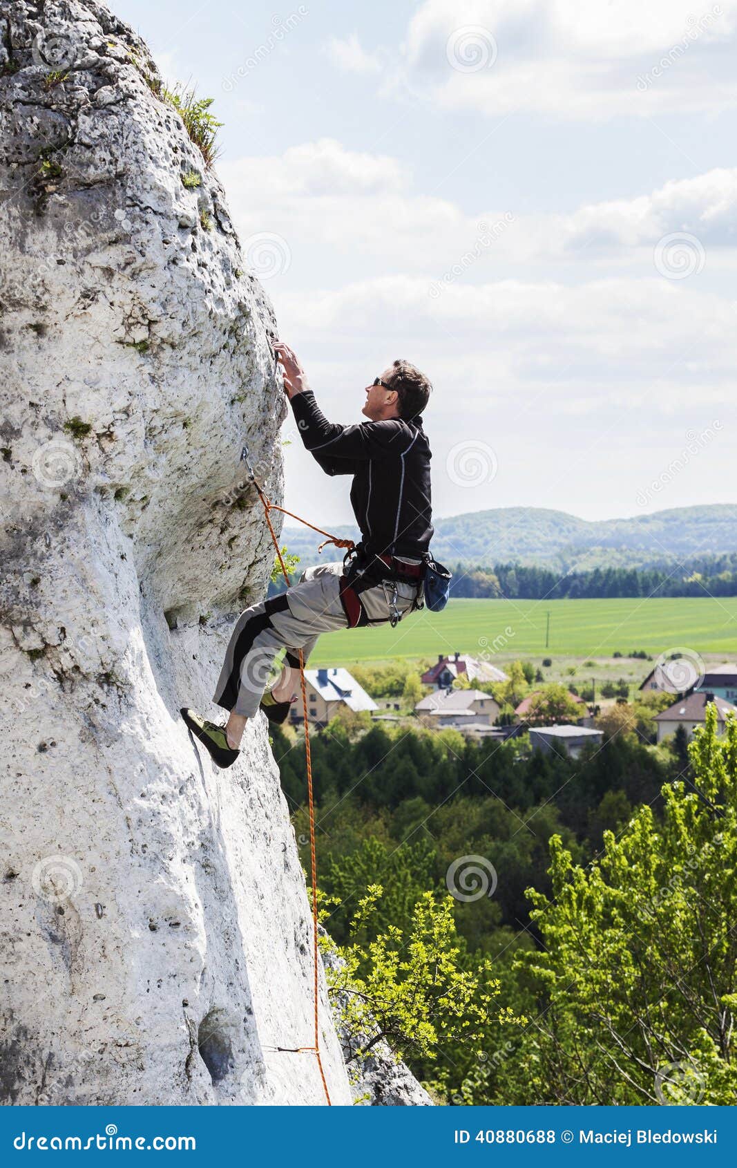 Man Climbing Difficult Rocky Wall. Stock Photo - Image of stone ...