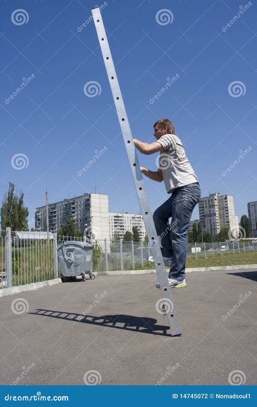 Man climbing ladder stock photo. Image of competition - 14745072