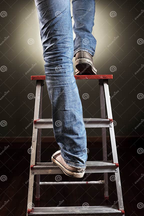 Man climbing on ladder stock photo. Image of builder - 37815428