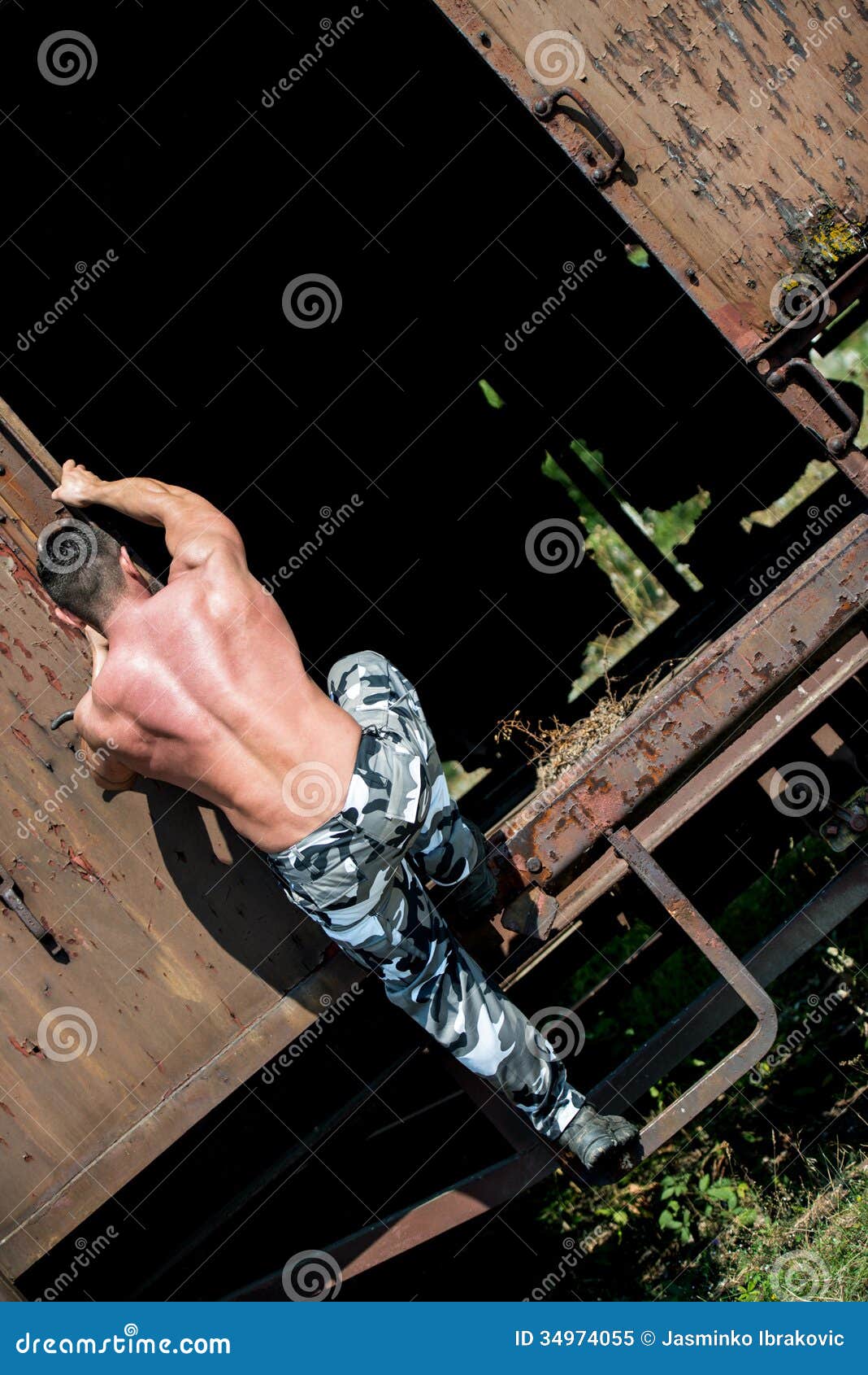 Man Climbing a Ladder stock image. Image of muscular - 34974055