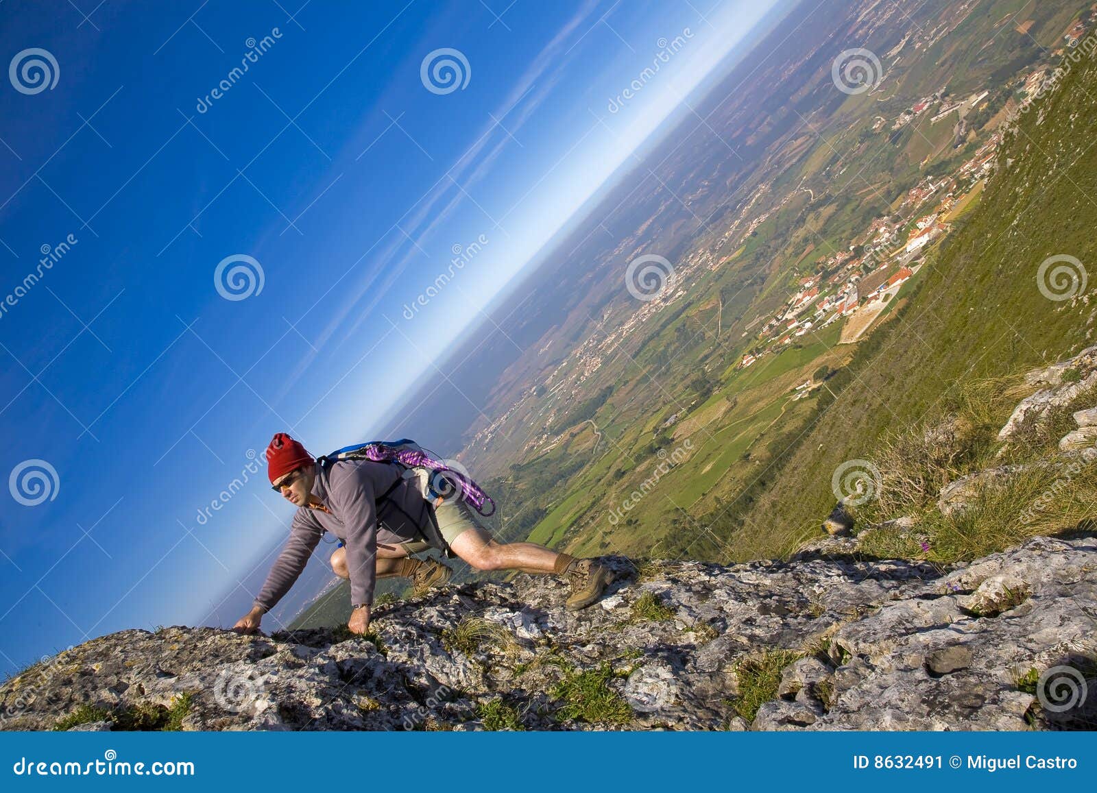 Man Climbing a mountain stock image. Image of climber - 8632491