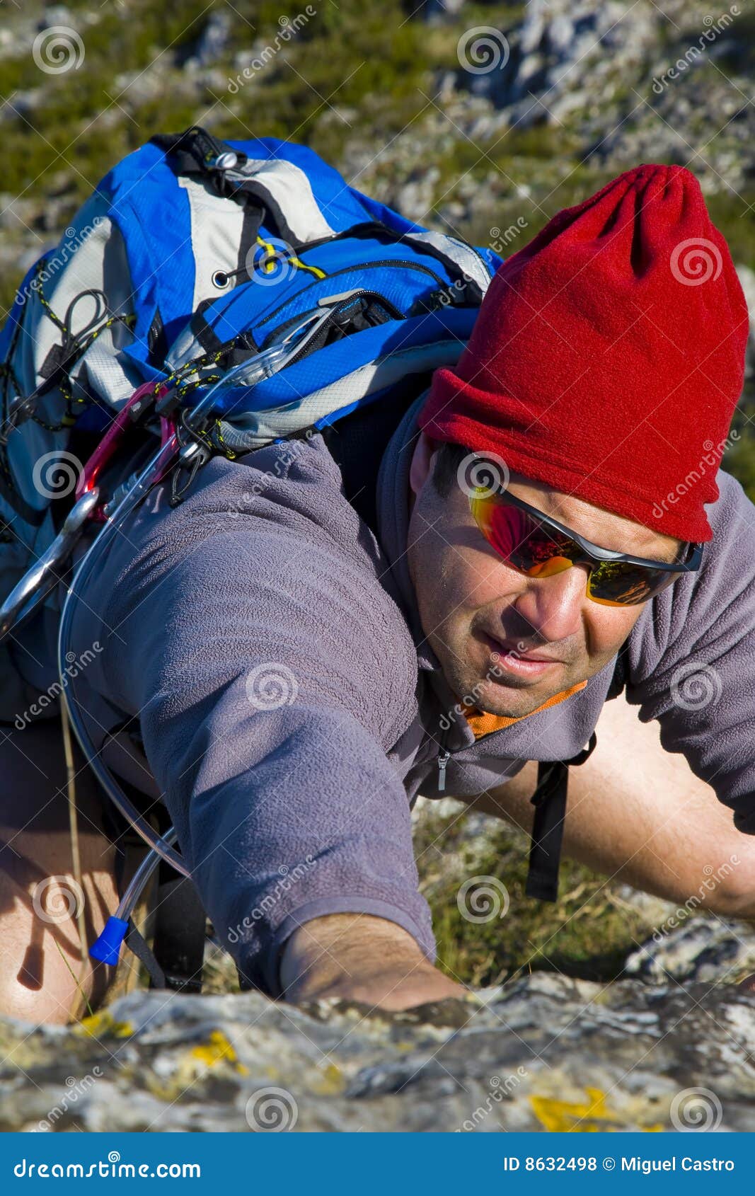 Man Climbing a mountain stock photo. Image of gymnastics - 8632498