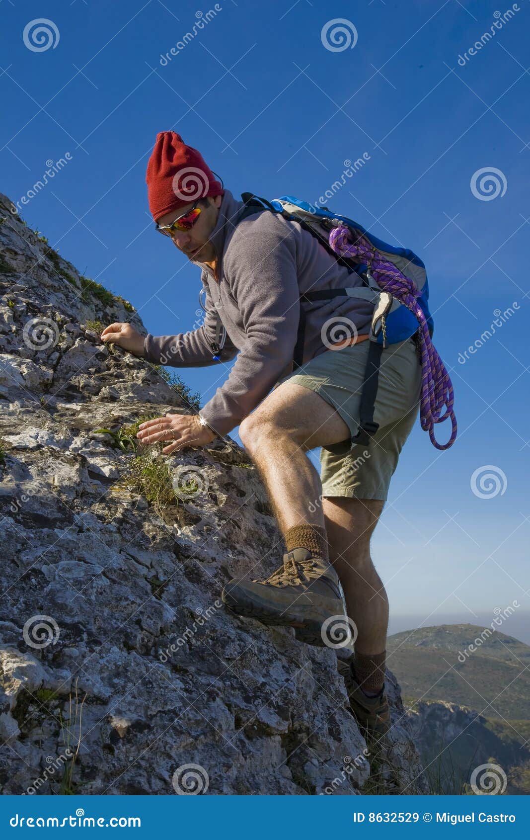 Man Climbing a mountain stock image. Image of blue, beauty - 8632529