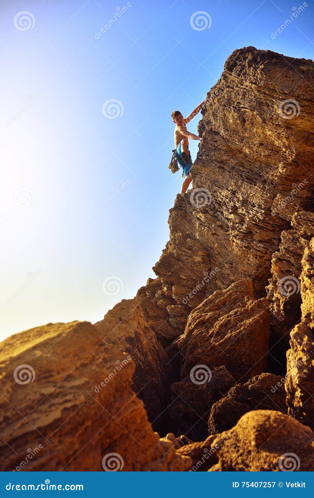 Man climbing on Mountain stock image. Image of endurance - 75407257