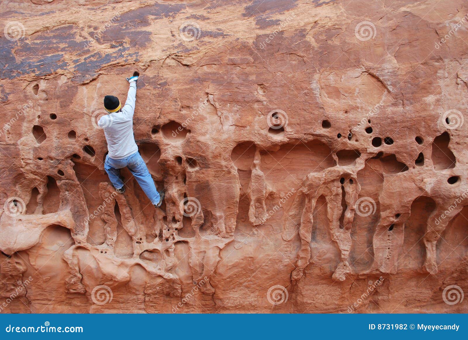 Man climbing rock face stock photo. Image of face, desert - 8731982