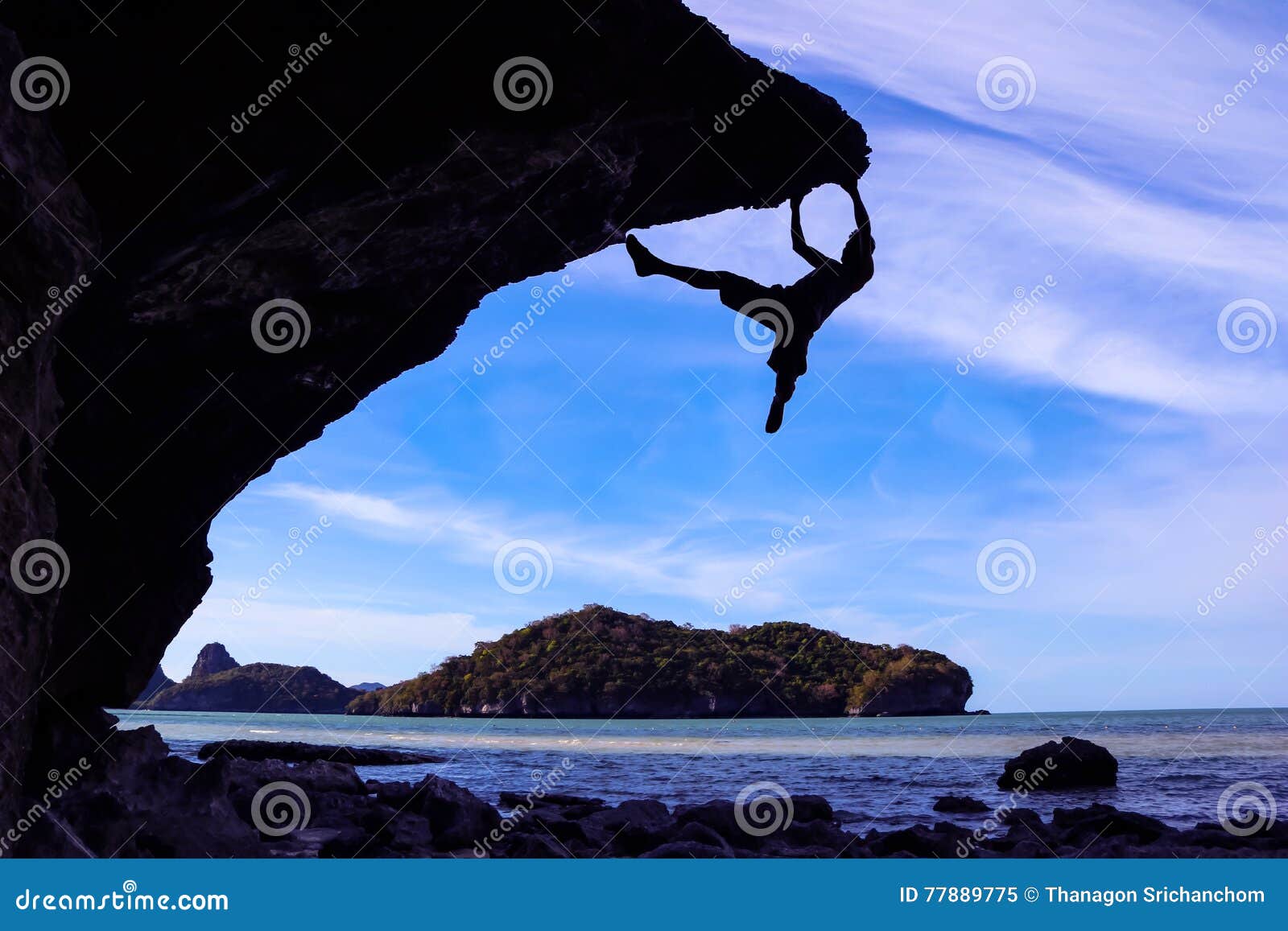 Man Climbing the Rocks on the Beach. Stock Image - Image of park ...