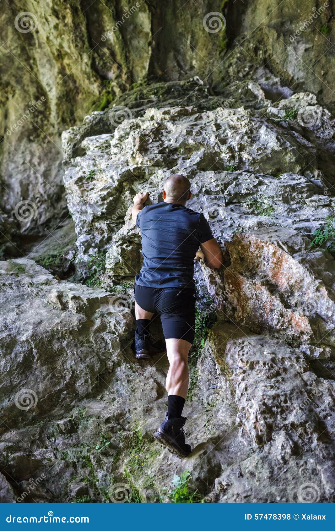 Man Climbing on Rocky Mountain Stock Photo - Image of determination ...