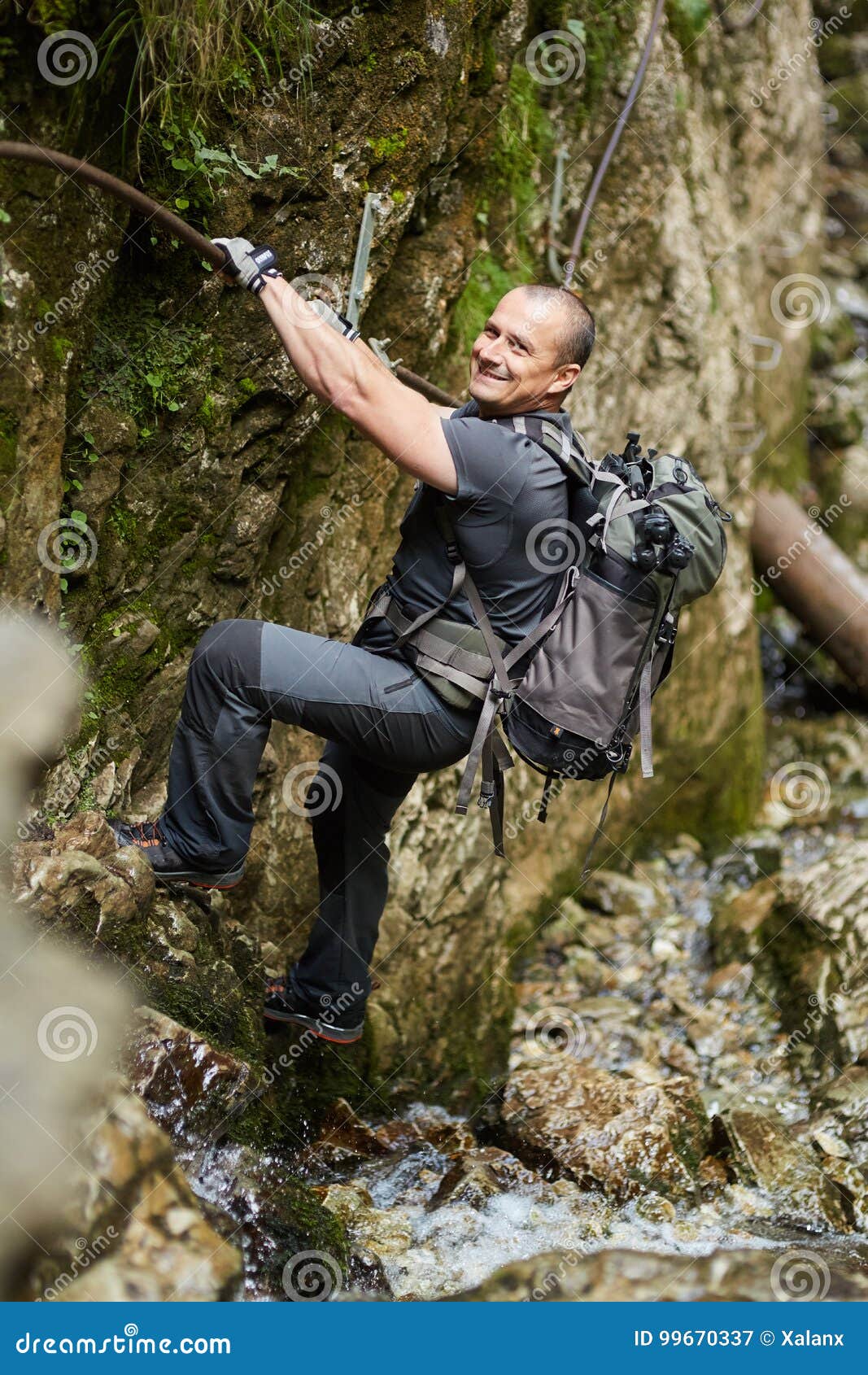 Man Climbing on Safety Chains Stock Image - Image of hiker, lifestyle ...