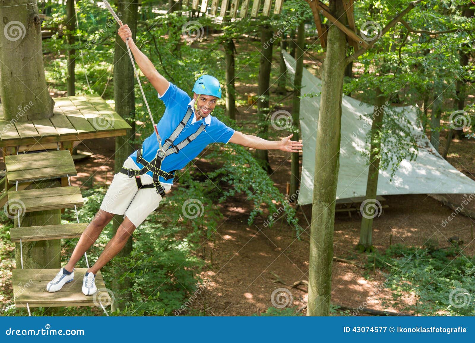 Man Climbs Over Obstacles at High Rope Court Stock Image - Image of ...