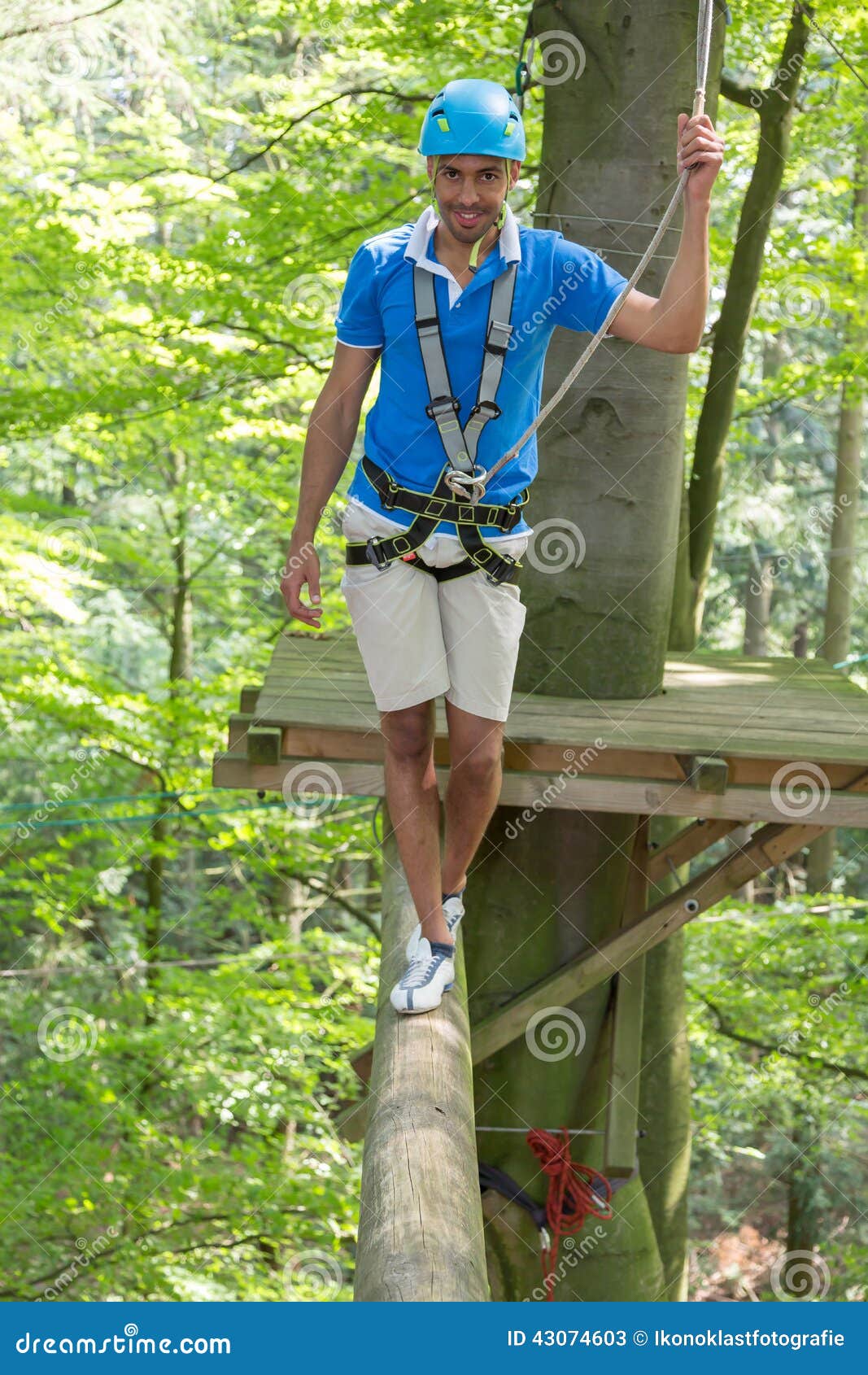 Man Climbs Over Obstacles at High Rope Court Stock Image - Image of ...