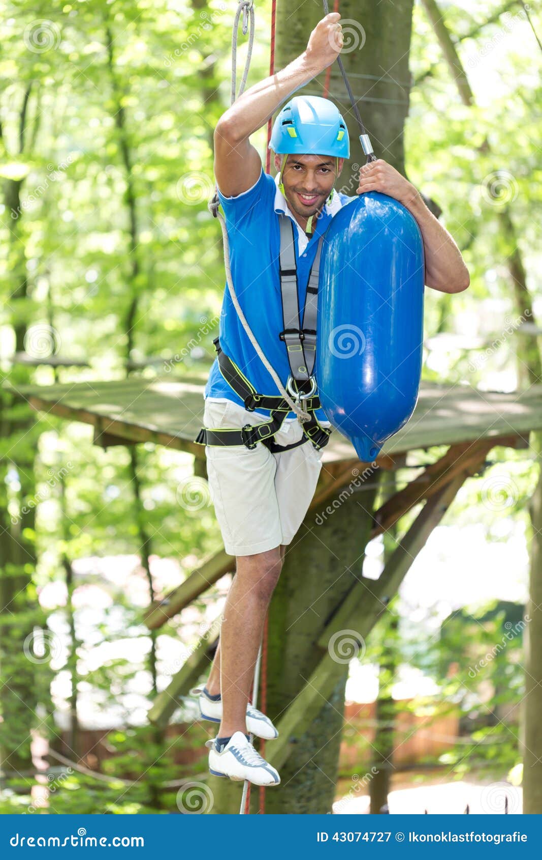 Man Climbs Over Obstacles at High Rope Court Stock Image - Image of ...