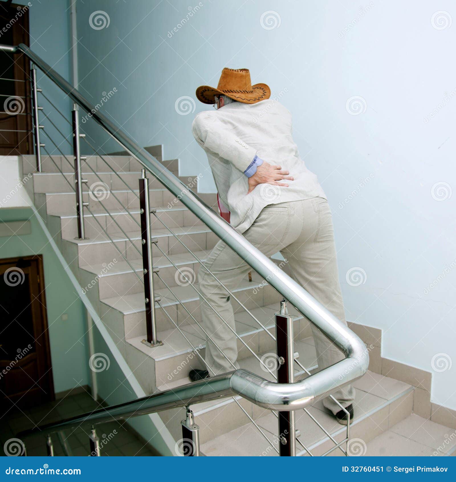 Man Climbs the Stairs with the Pain in His Back Stock Image - Image of ...