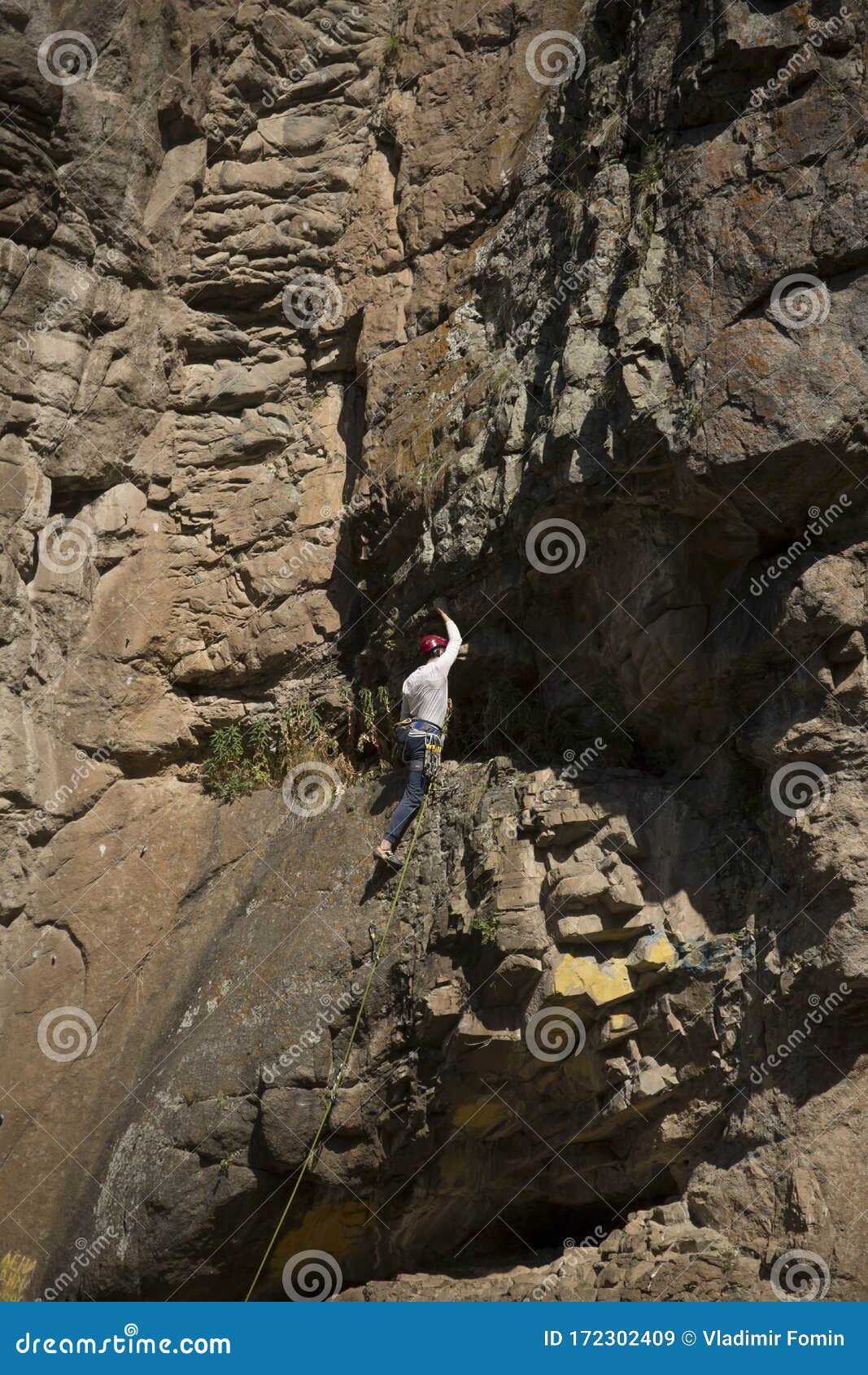 Man on the rock. editorial stock image. Image of walks - 172302409