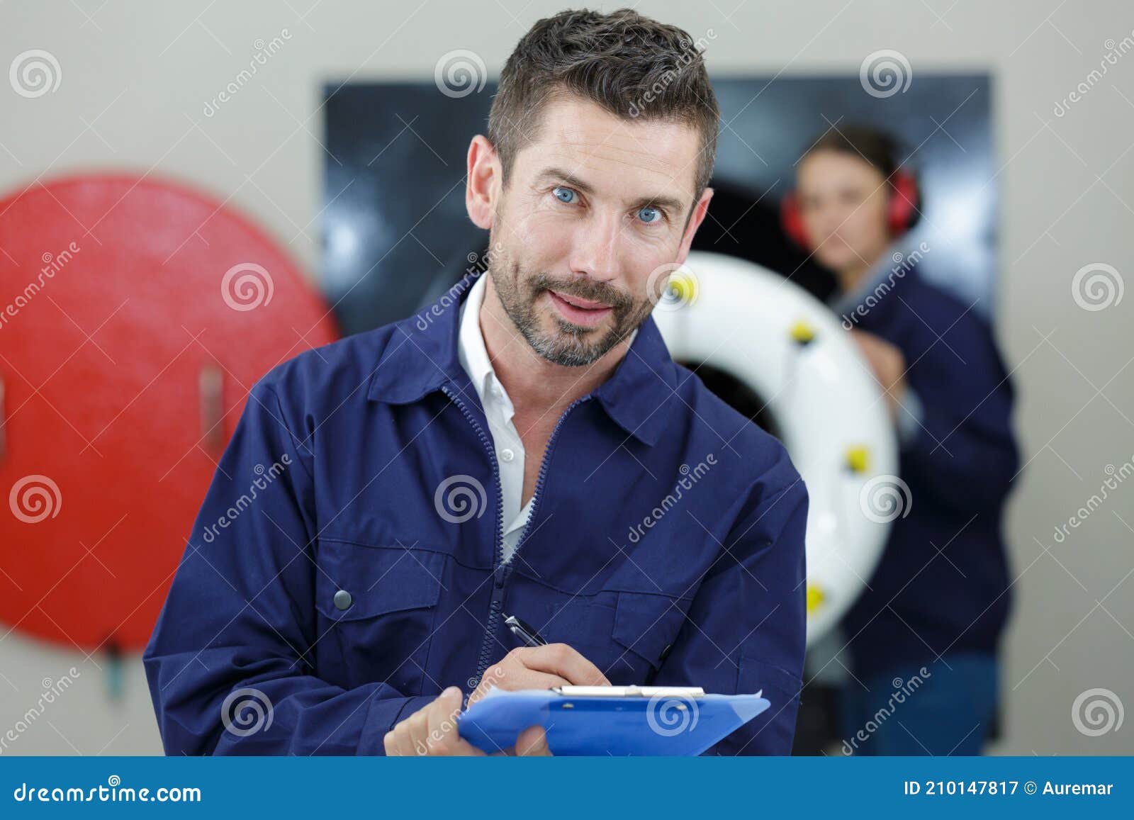 Man with Clipboard Looking at Camera Stock Image - Image of shirt ...
