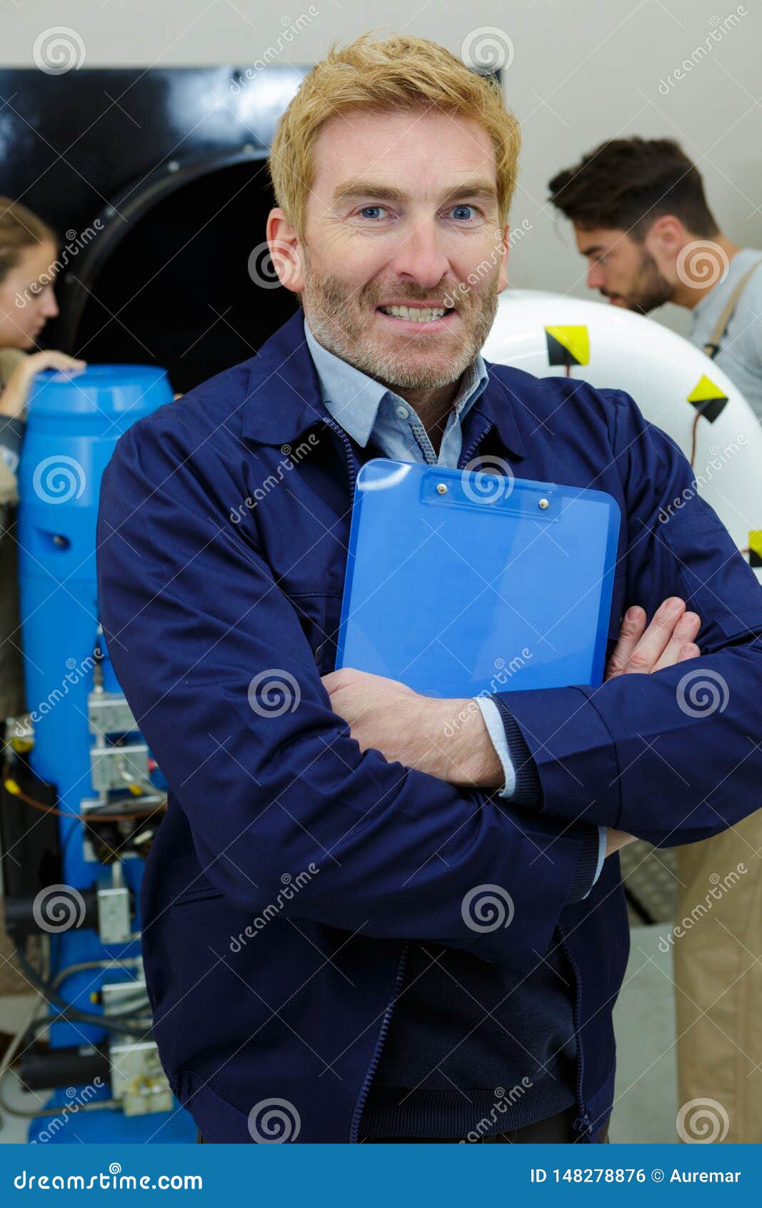 Man with Clipboard Looking at Camera Stock Photo - Image of serious ...