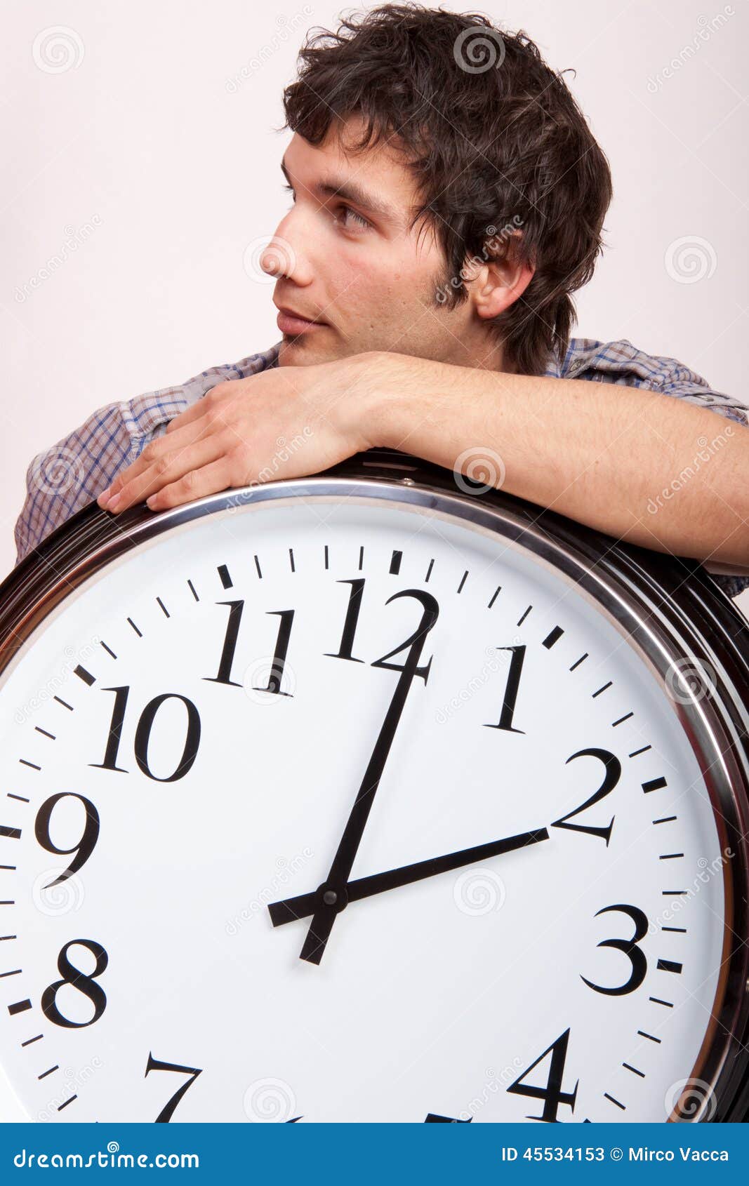 Man and clock stock image. Image of holding, person, time - 45534153