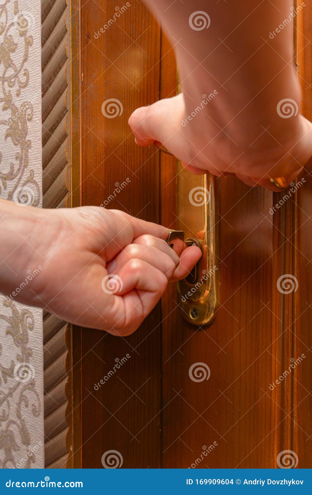 The Man Closes the Door Lock in the Apartment Stock Photo - Image of ...
