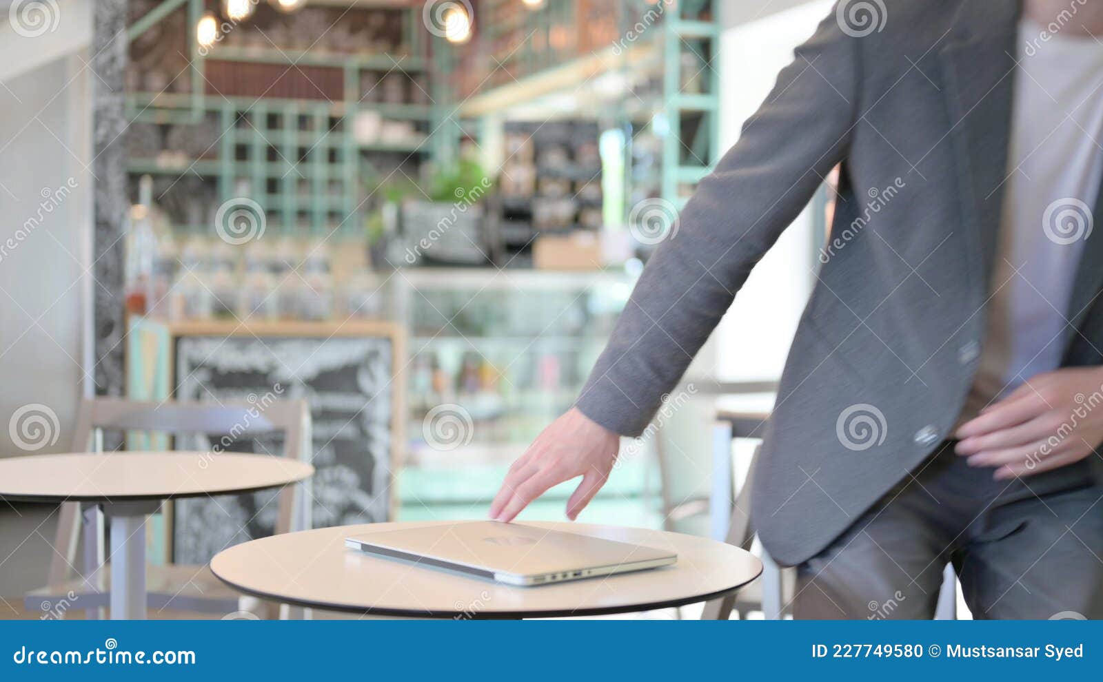 Young Man Closing Laptop and Leaving Cafe Stock Photo - Image of white ...