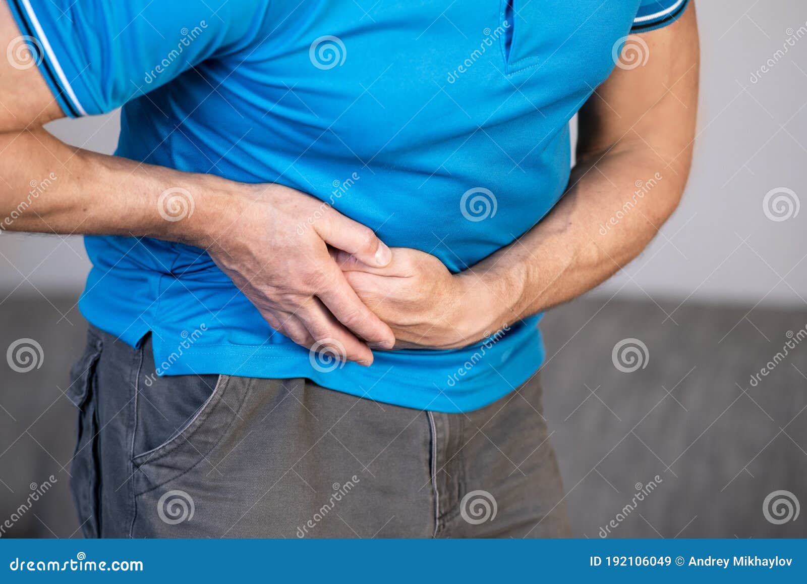 The Man Clutched at the Sore Spot. an Attack of Appendicitis Pain Stock ...