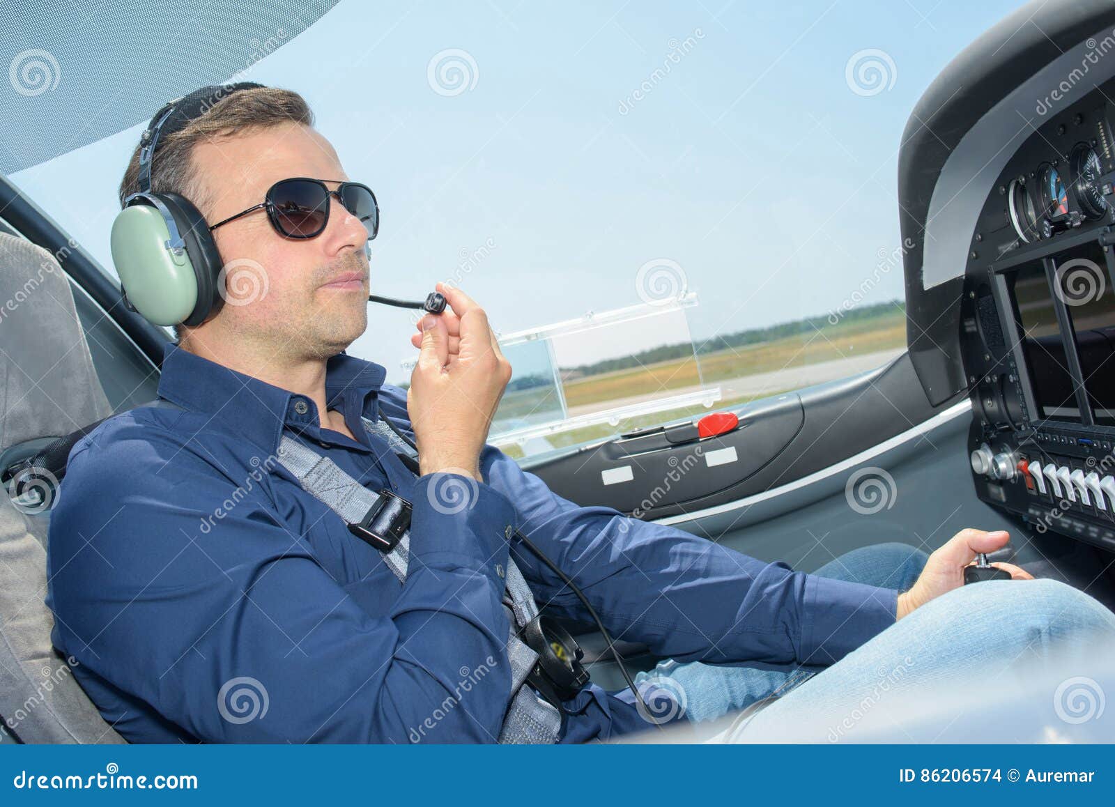 Man in Cockpit Aircraft Wearing Headphones with Microphone Stock Photo ...