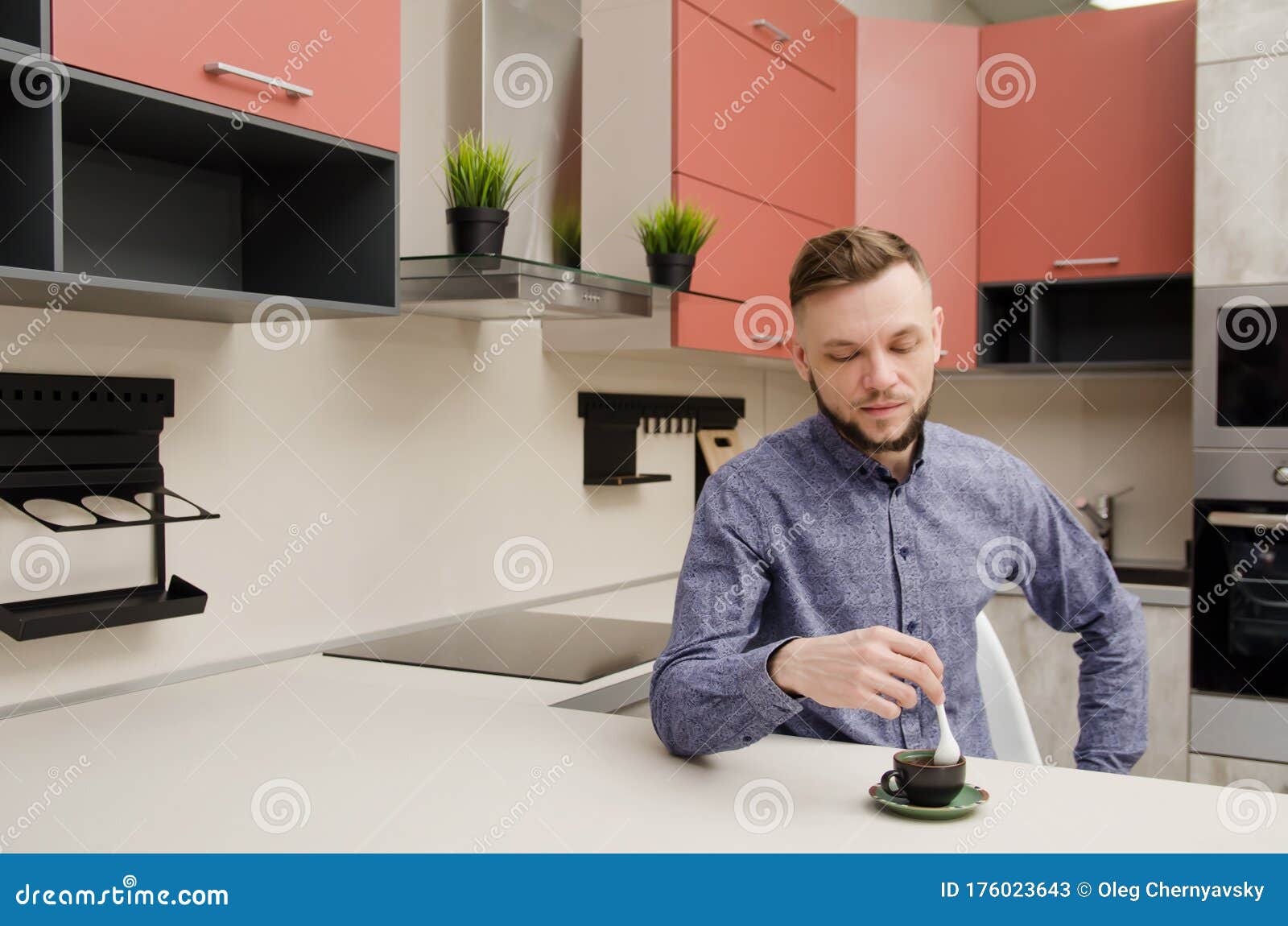 Man with Coffee Cup at the Table in Modern Kitchen Stock Image - Image ...
