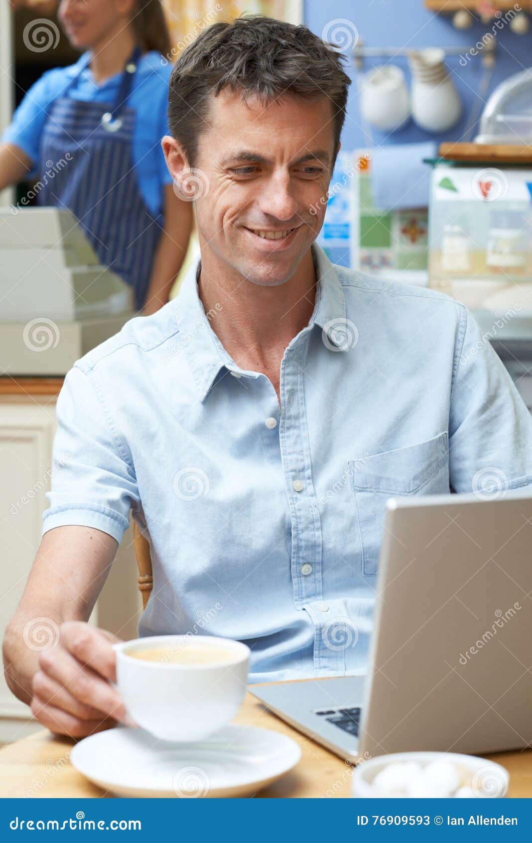 Man in Coffee Shop Using Laptop Computer Stock Image - Image of ...