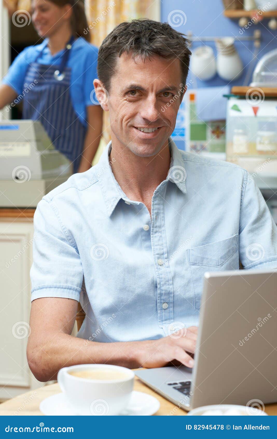 Man in Coffee Shop Using Laptop Computer Stock Photo - Image of female ...