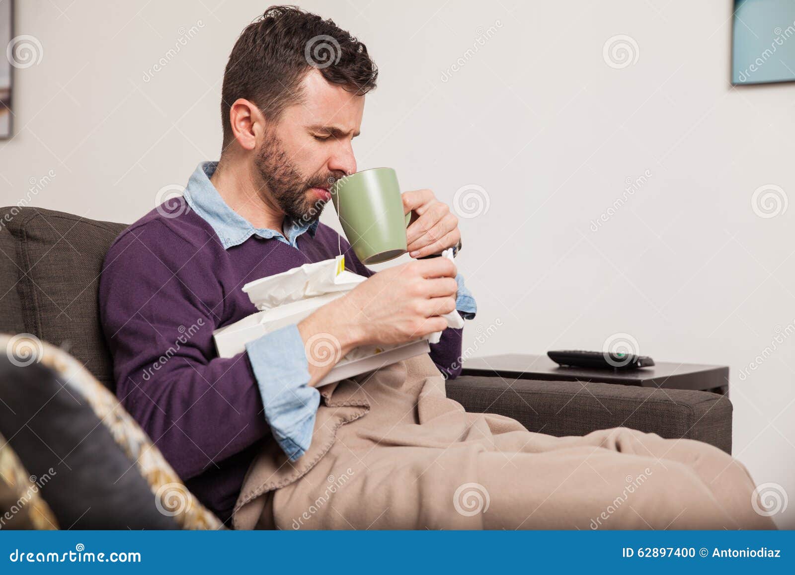 Man with a Cold Drinking Some Tea Stock Photo - Image of casual, adult ...
