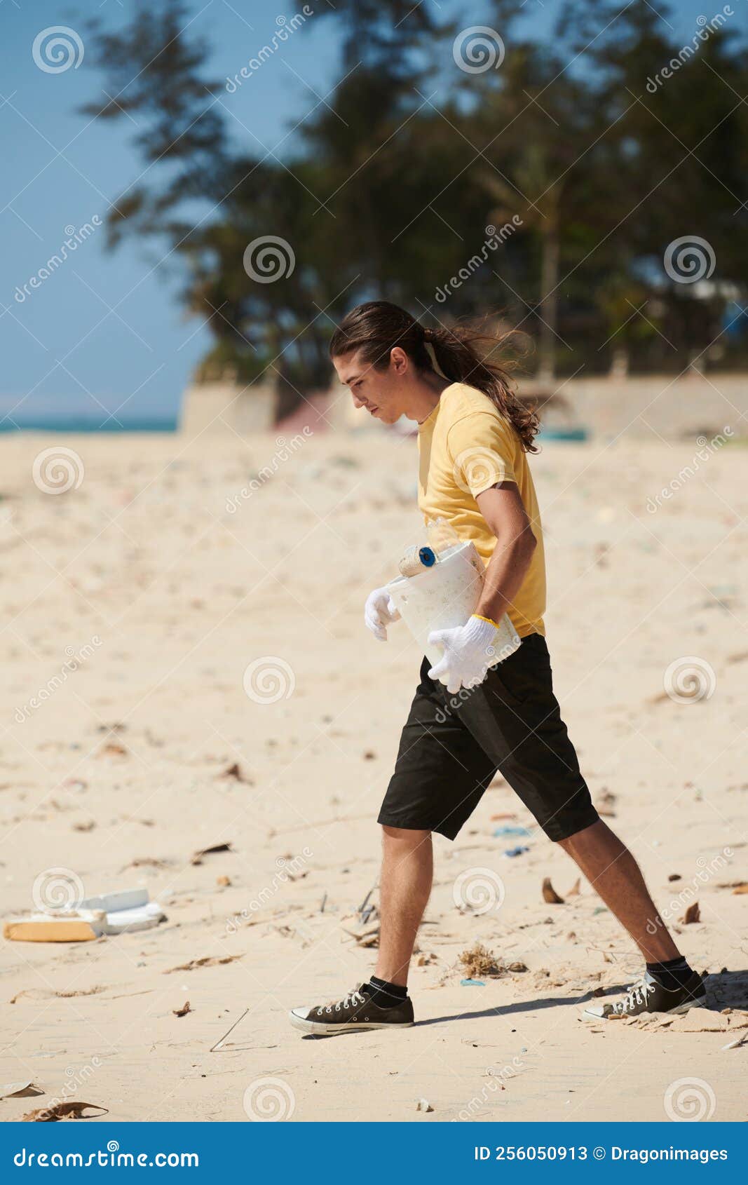Man Collecting Garbage on Beach Stock Image - Image of trash ...