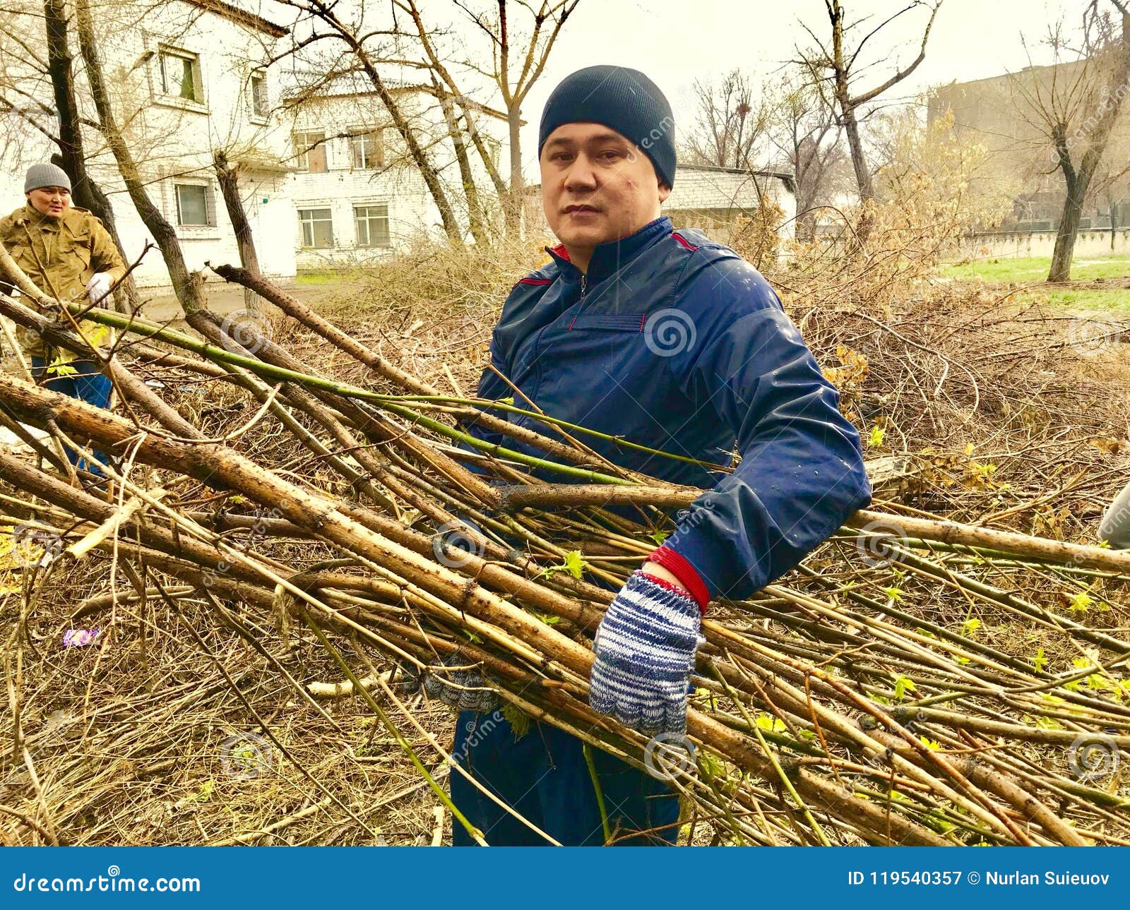Man collecting garbage editorial photography. Image of waste - 119540357