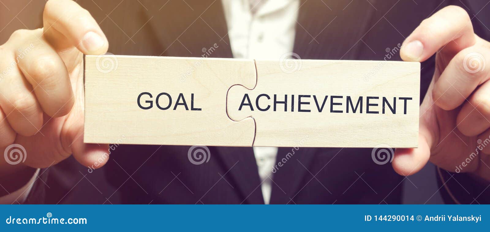 Man Collects Puzzles with the Words Goal Achievement. the Solution of ...