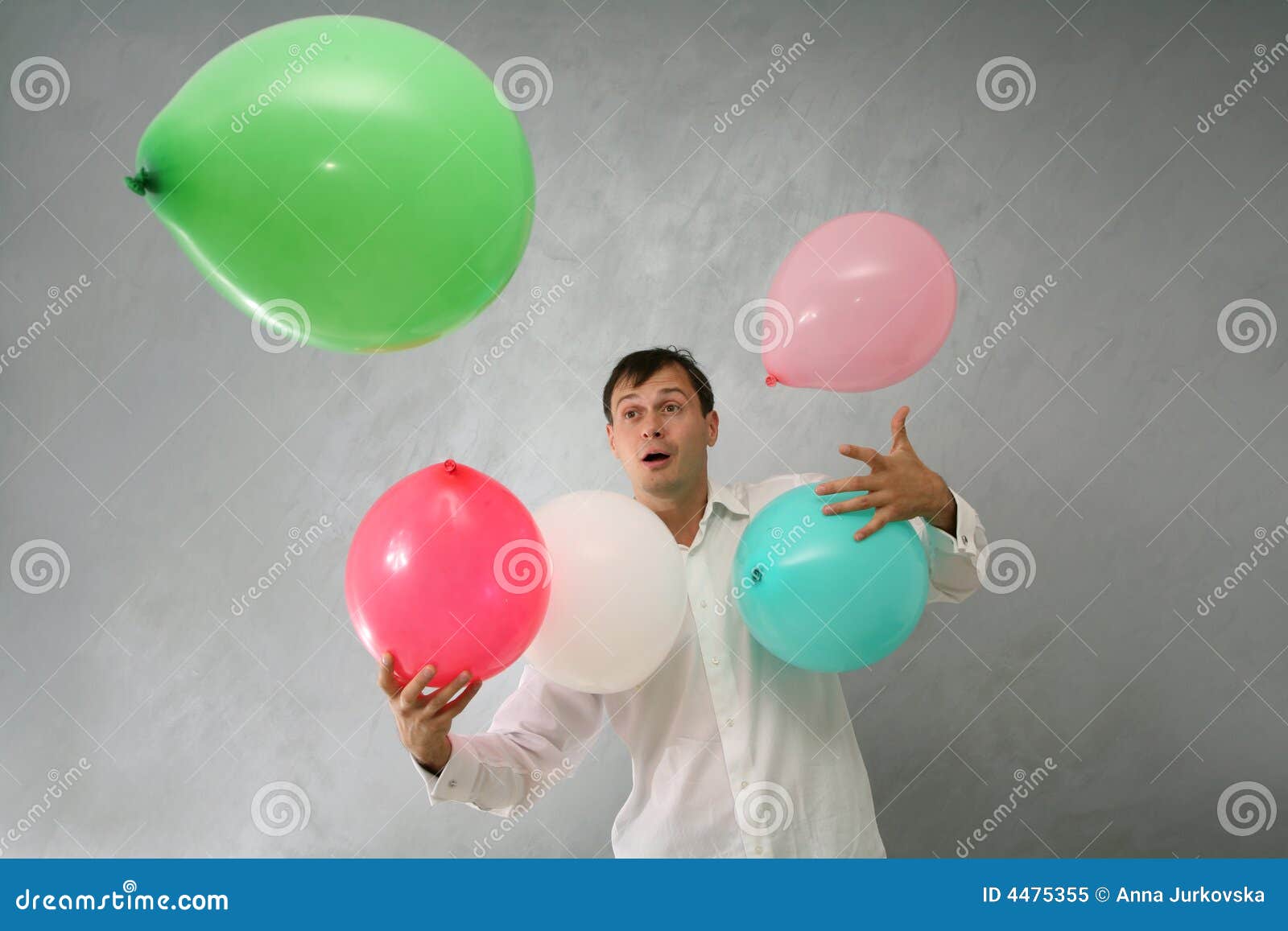 Man with colorful baloons stock image. Image of colour - 4475355