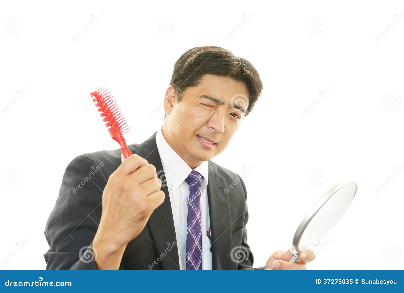 Man combing his hair stock image. Image of attractive - 37278035