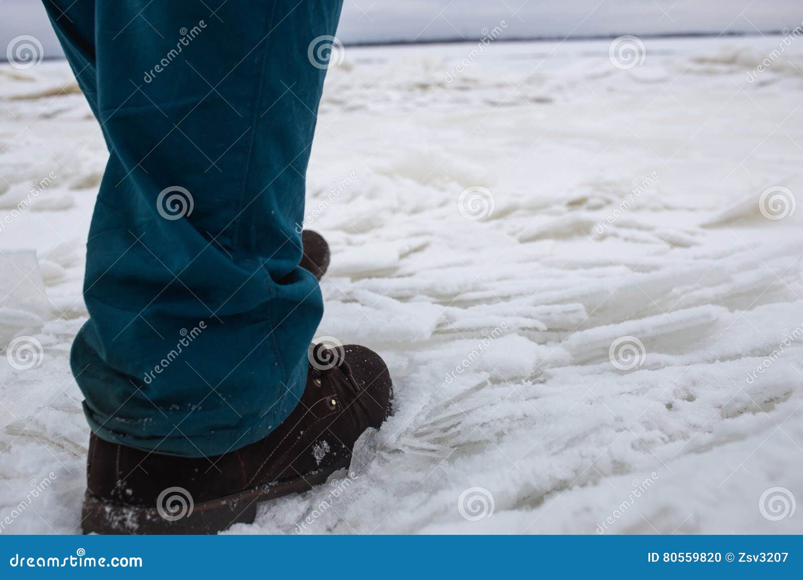 Man Comes on the Weak Bad River Ice. Concept Danger Falling through the ...