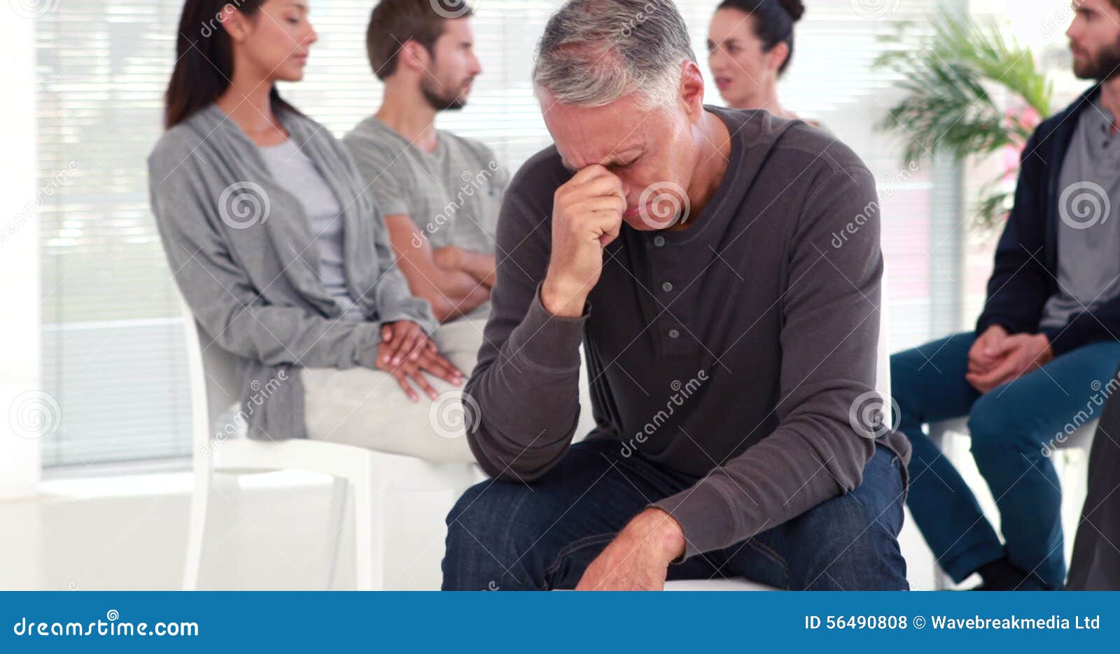 Man Comforting Another in Rehab Group at Therapy Stock Footage - Video ...