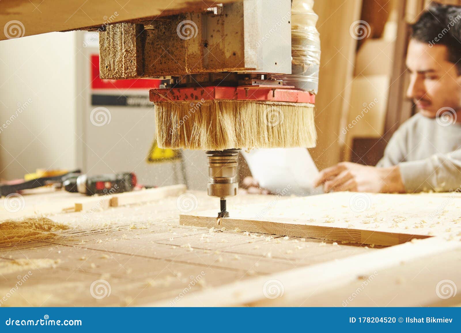 Man Compares the CNC Machine with the Drawing. Device with Numerical ...